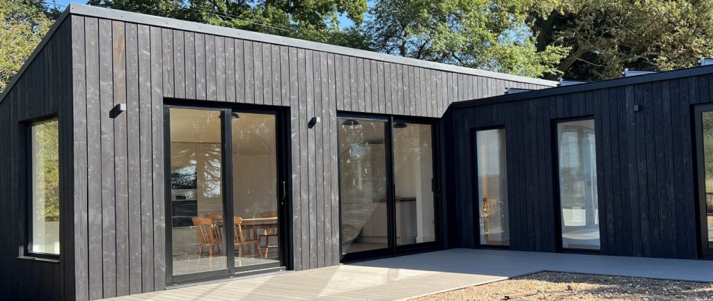 Two bed modular home delivered to London with added shed | Building ...